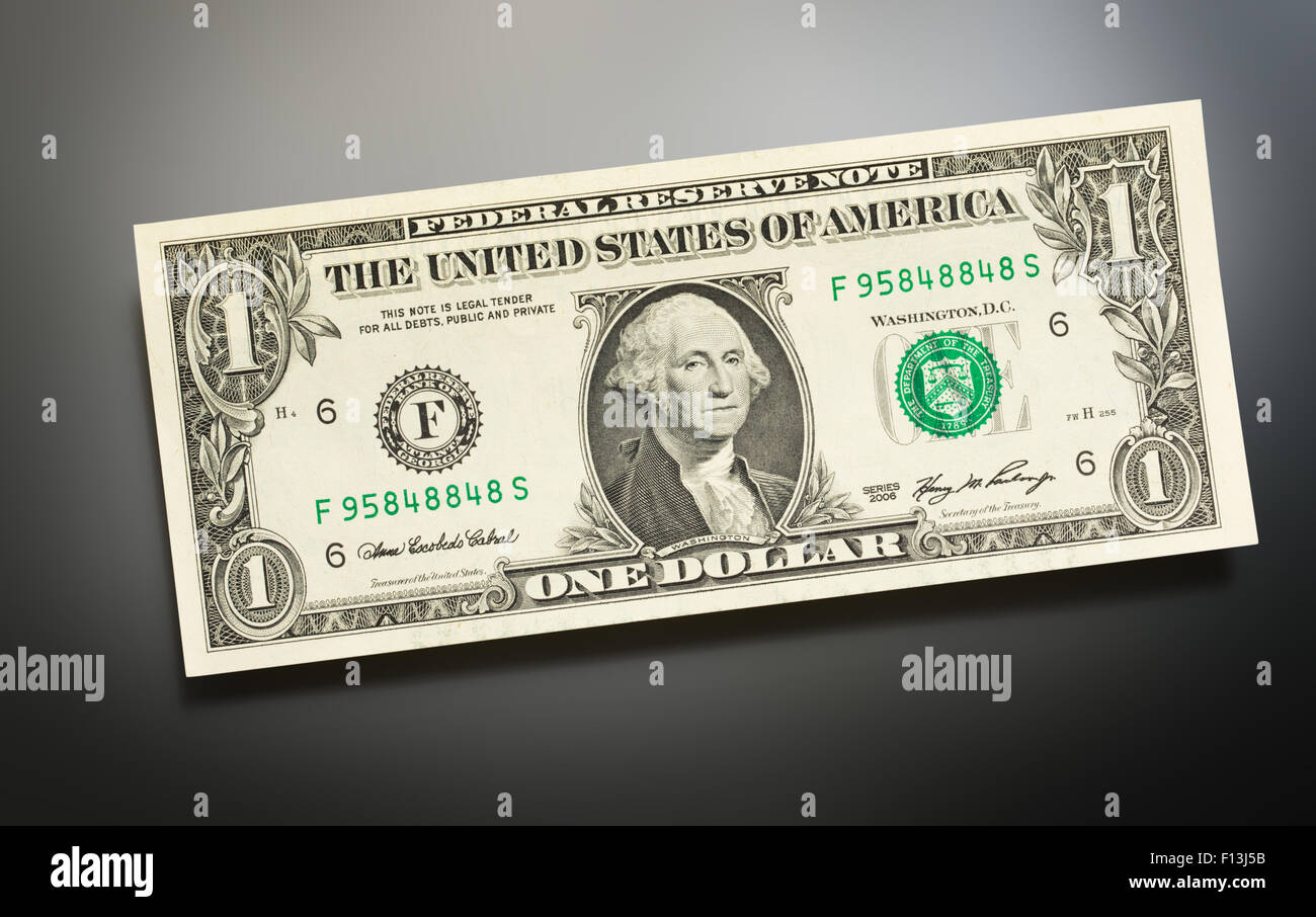 Dollar banknotes in closeup on grey background Stock Photo - Alamy