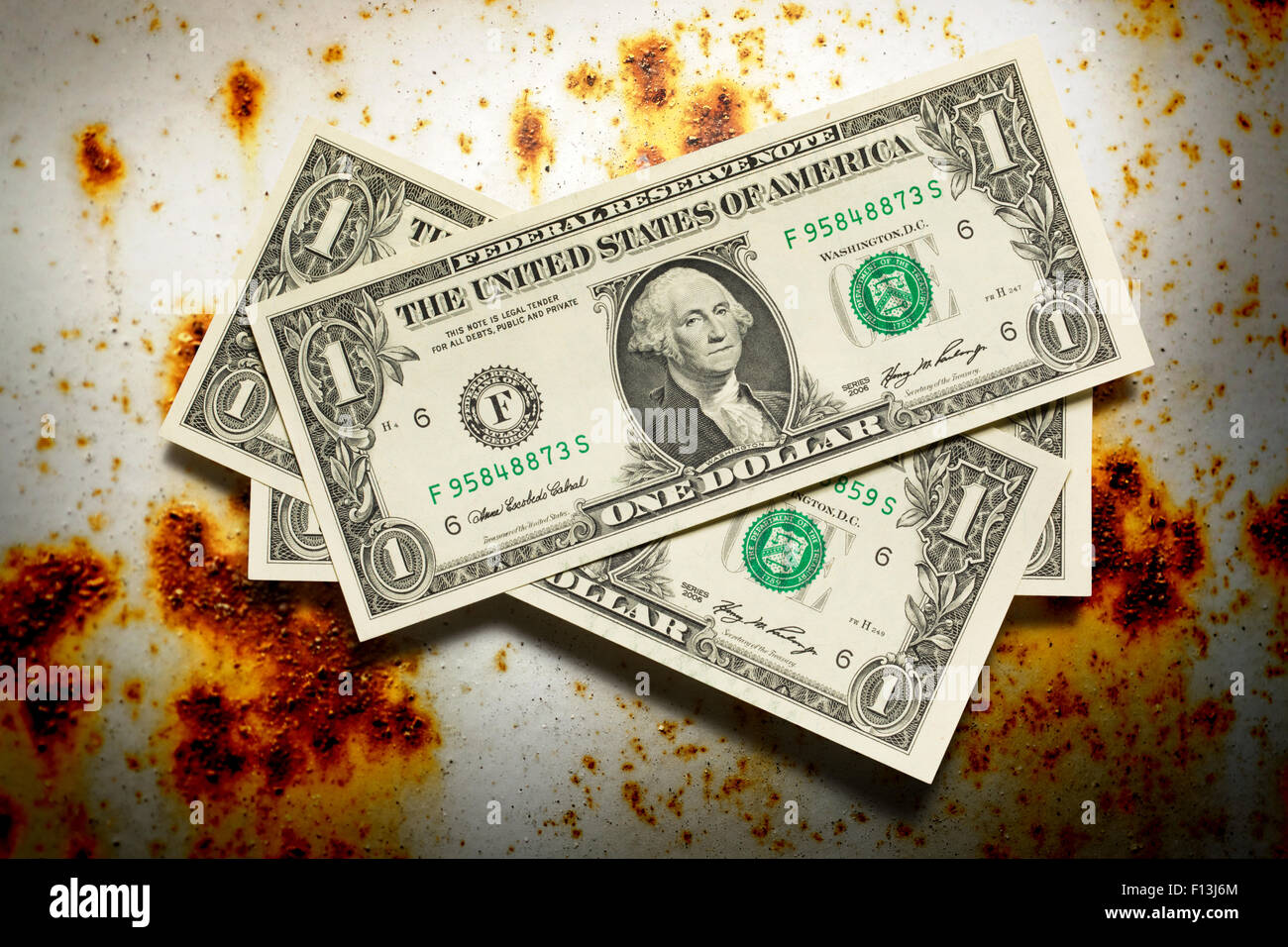 Dollar banknotes on rusty background in closeup Stock Photo - Alamy