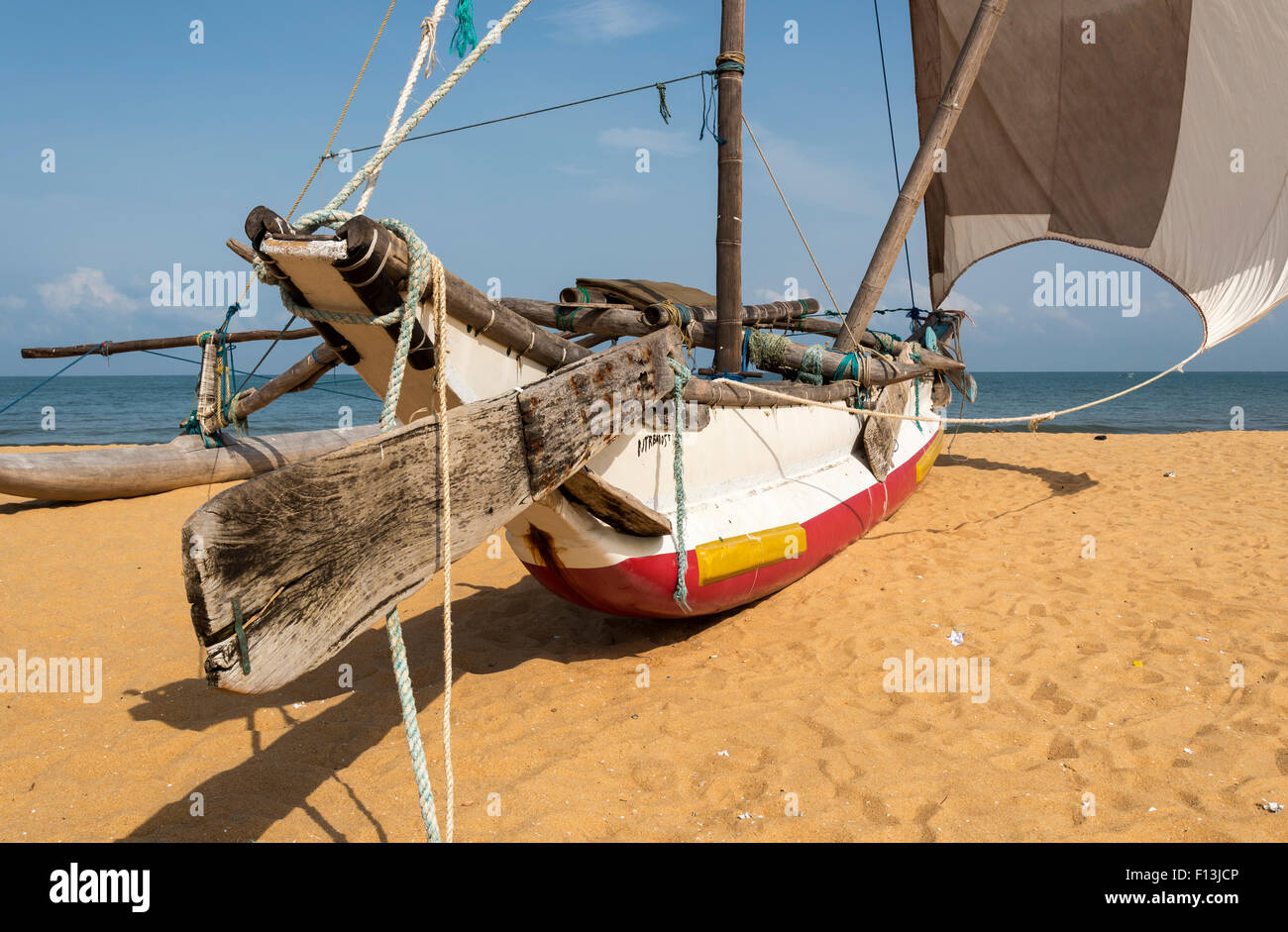 Traditional Catamaran Fishing Boat (Oruva) with White Sail on Sand of ...