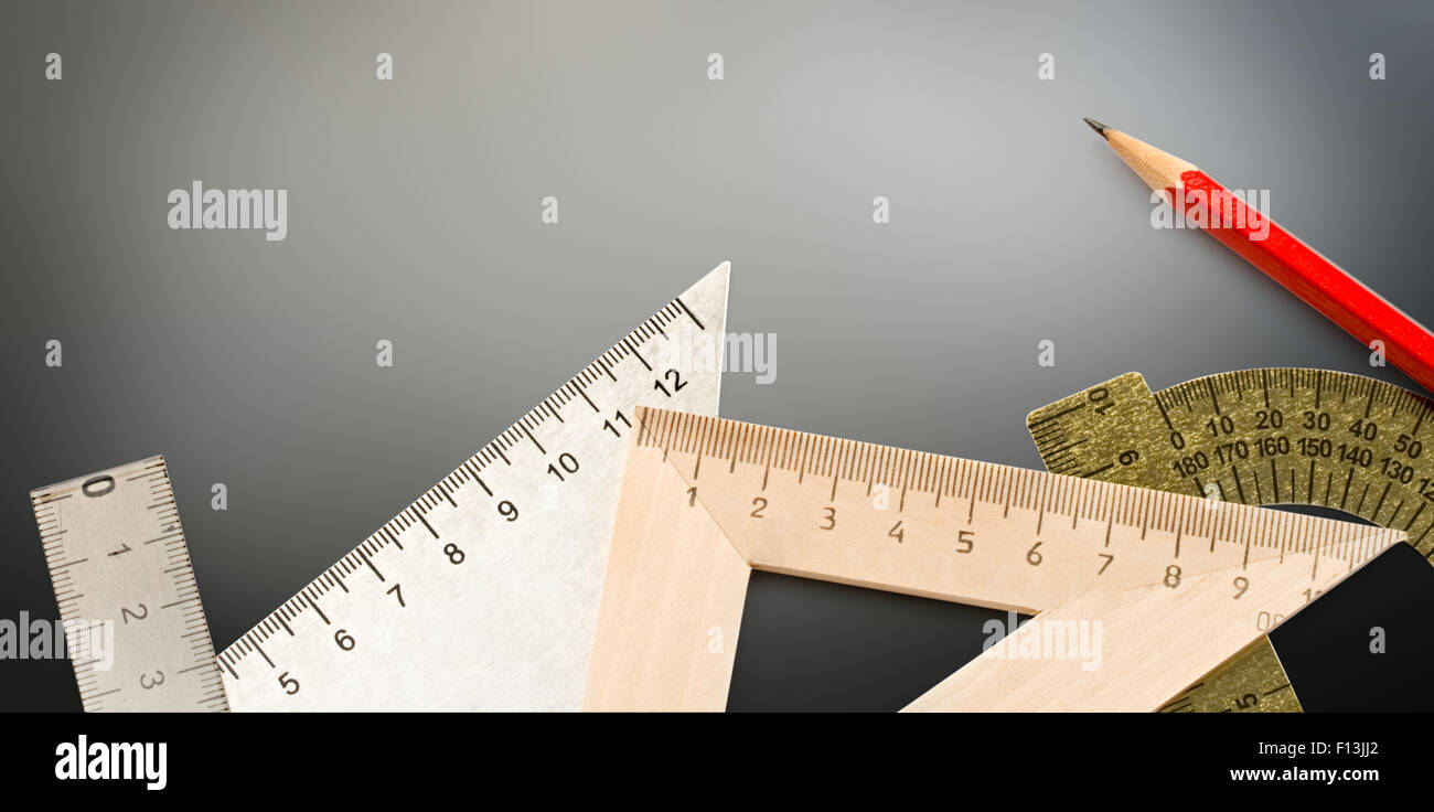 Drafting tools with red pencil in closeup Stock Photo - Alamy