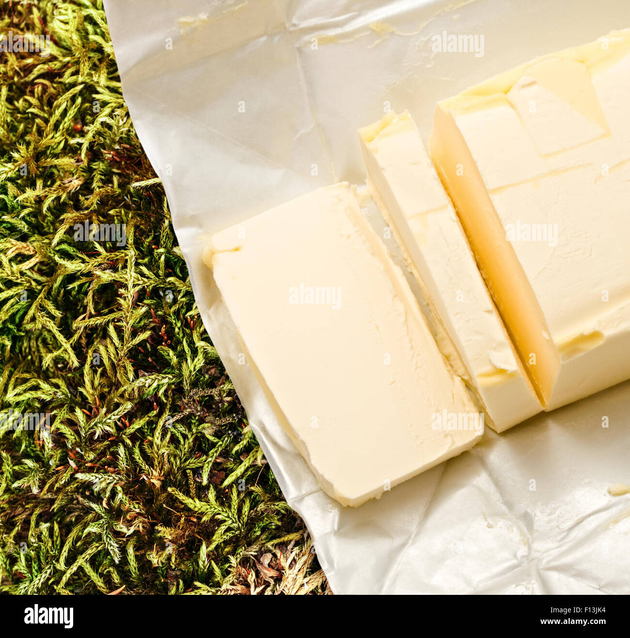 Margarine opened and cut fresh in closeup Stock Photo - Alamy