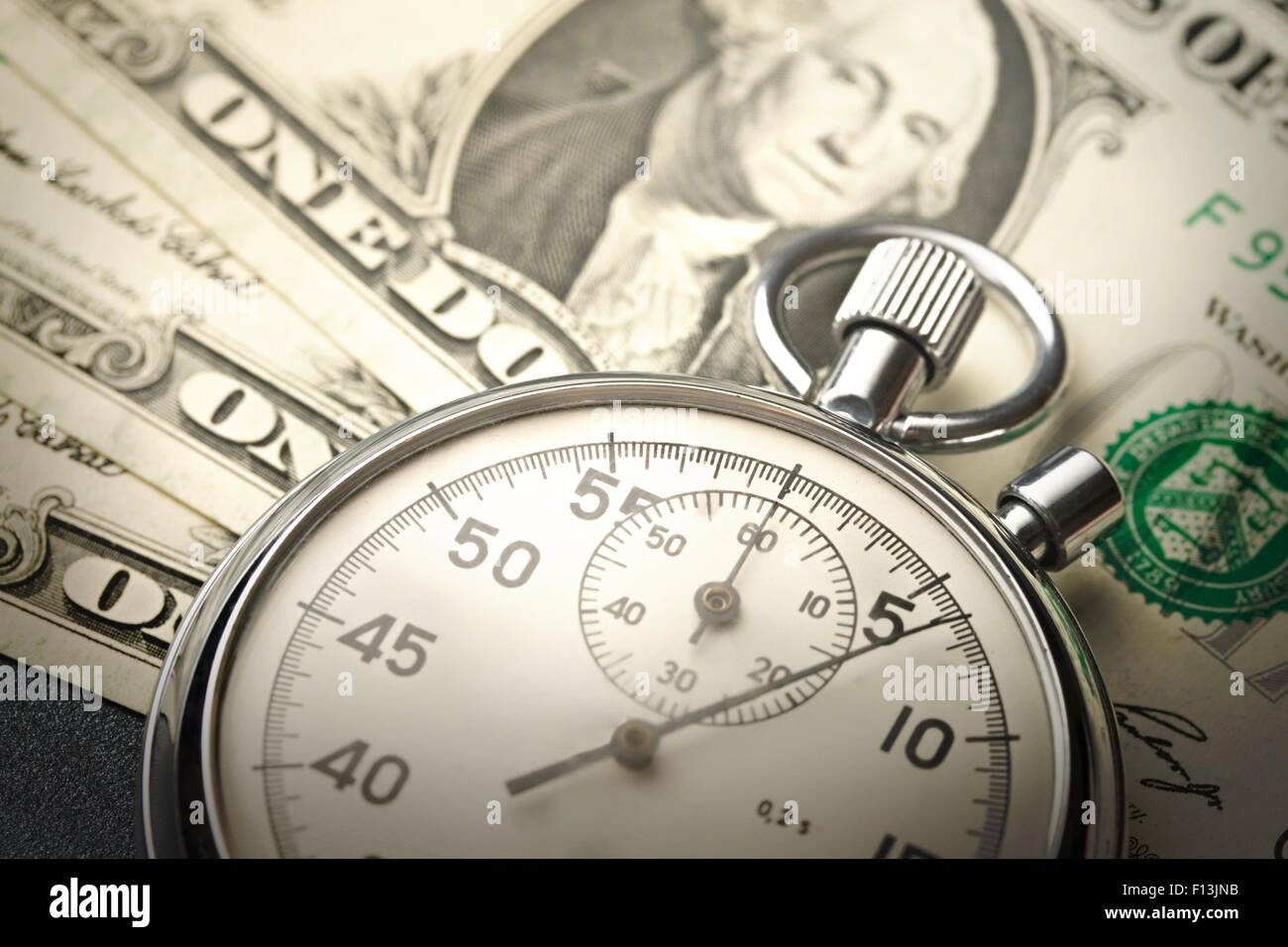 Time money concept stopwatch hi-res stock photography and images - Alamy