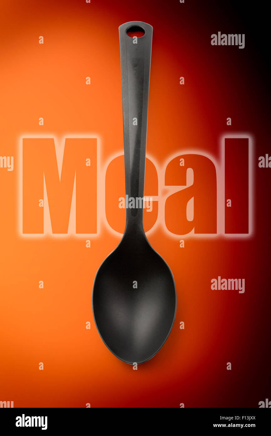 Black plastic kitchen spoon vertical in closeup Stock Photo - Alamy