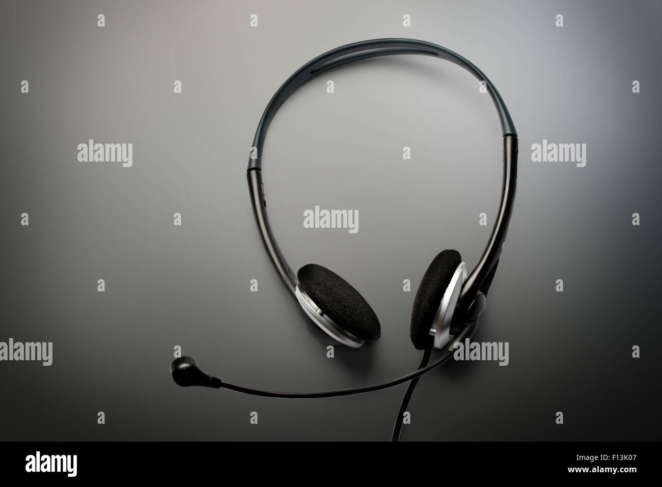 Black headset of headphones and microphone closeup Stock Photo - Alamy