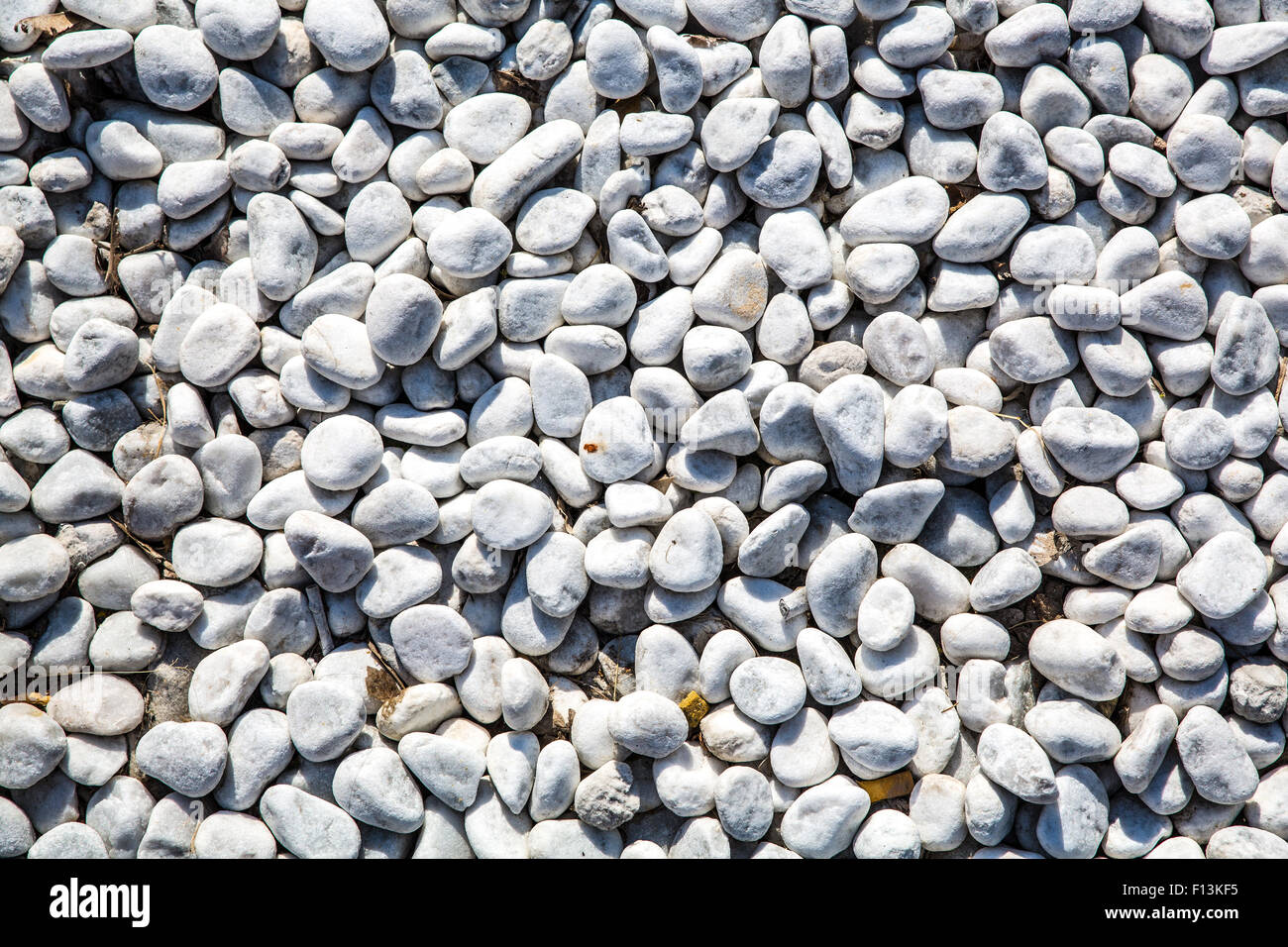 A white pebble stone background Stock Photo - Alamy