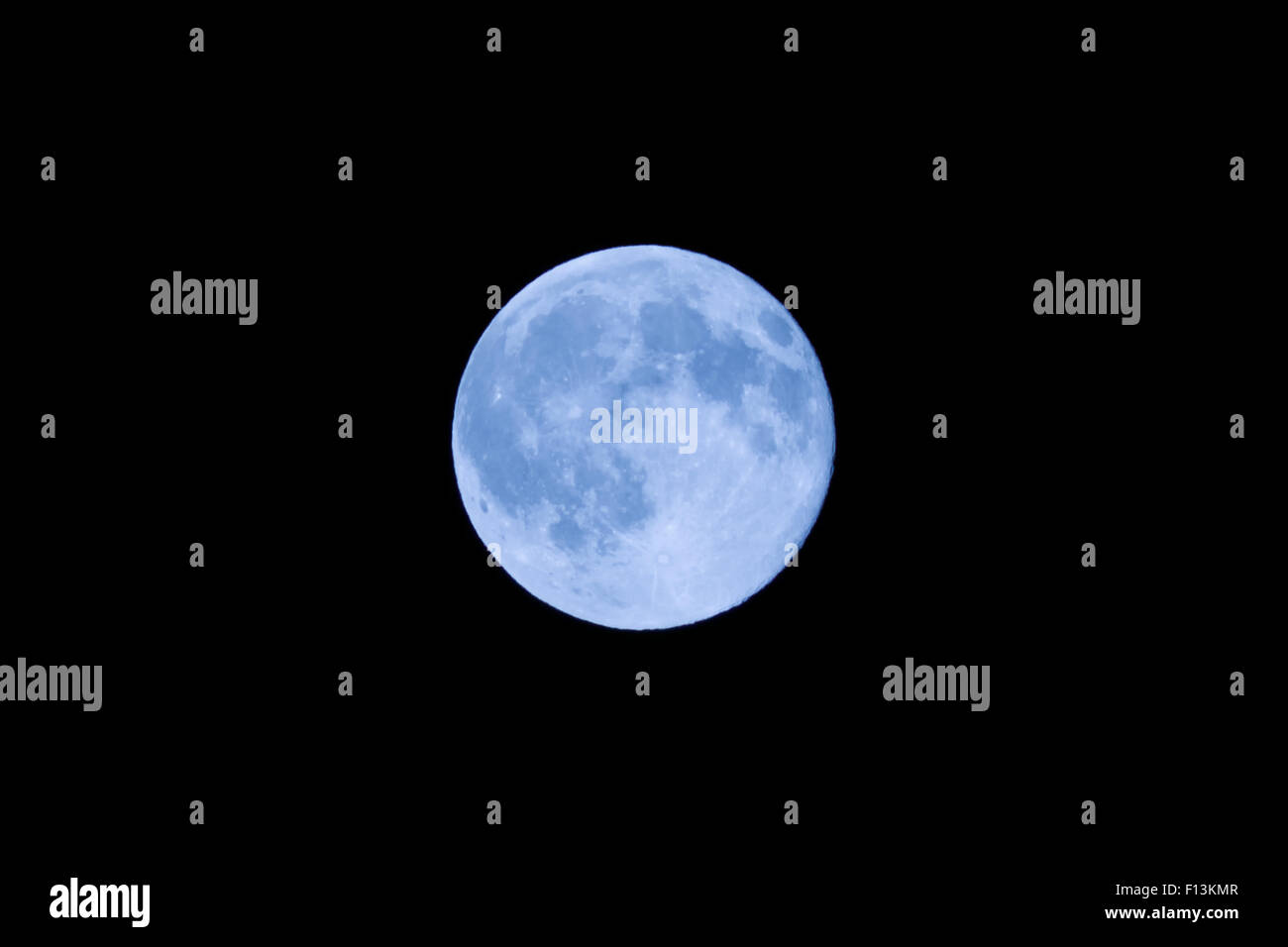 Once in a blue moon Stock Photo - Alamy