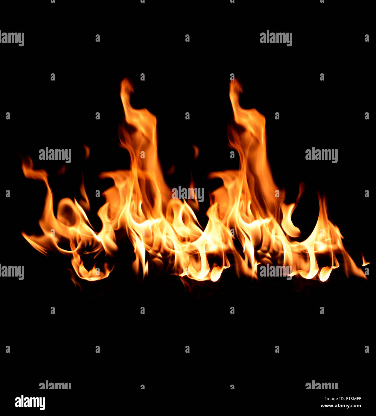 The red flames on a black background Stock Photo - Alamy