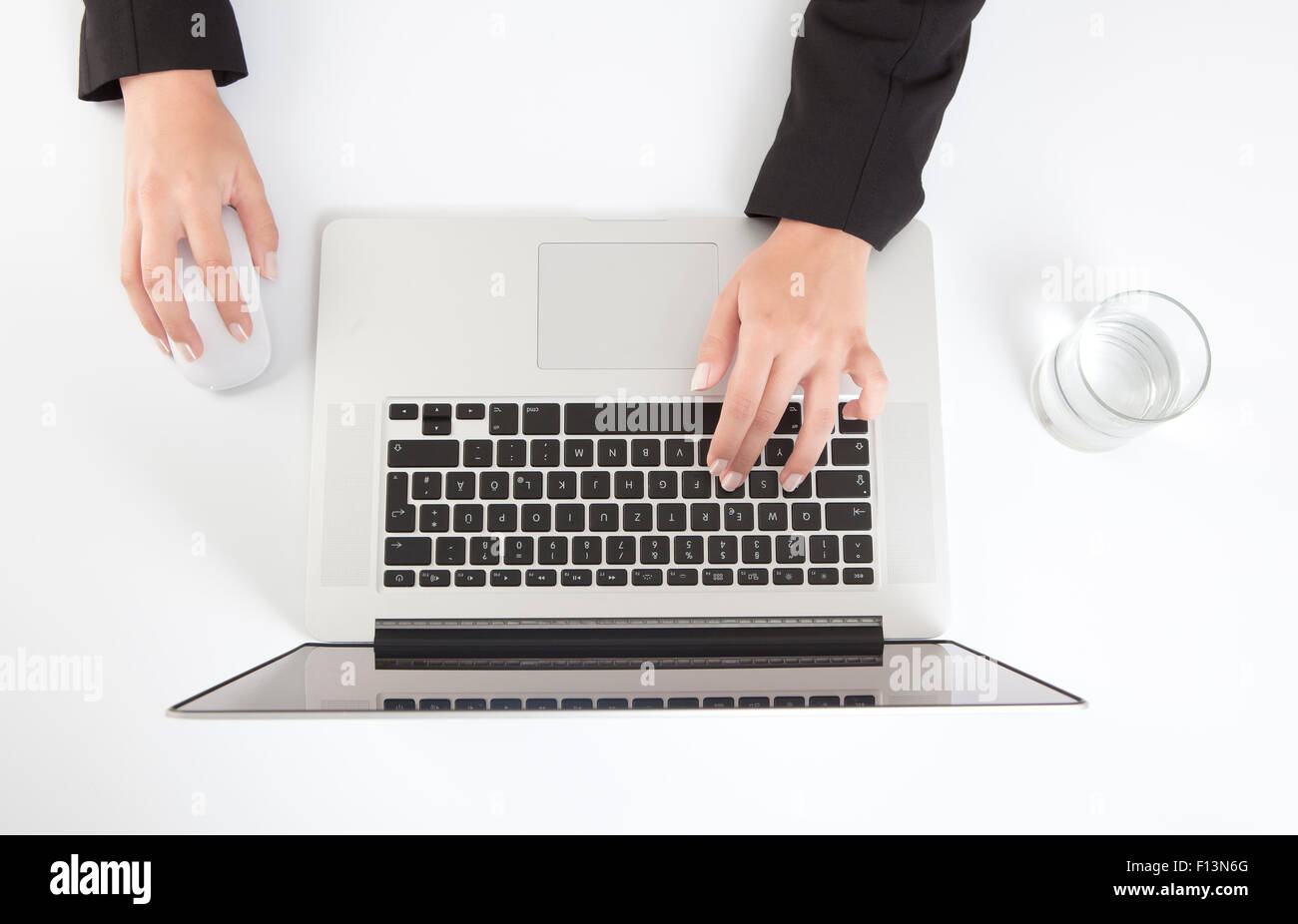 Woman typing in office hi-res stock photography and images - Alamy