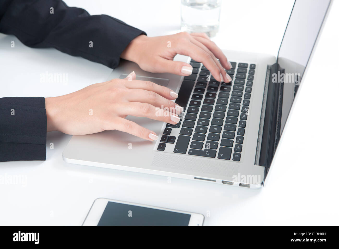 Woman hands in an office working on a computer Stock Photo - Alamy
