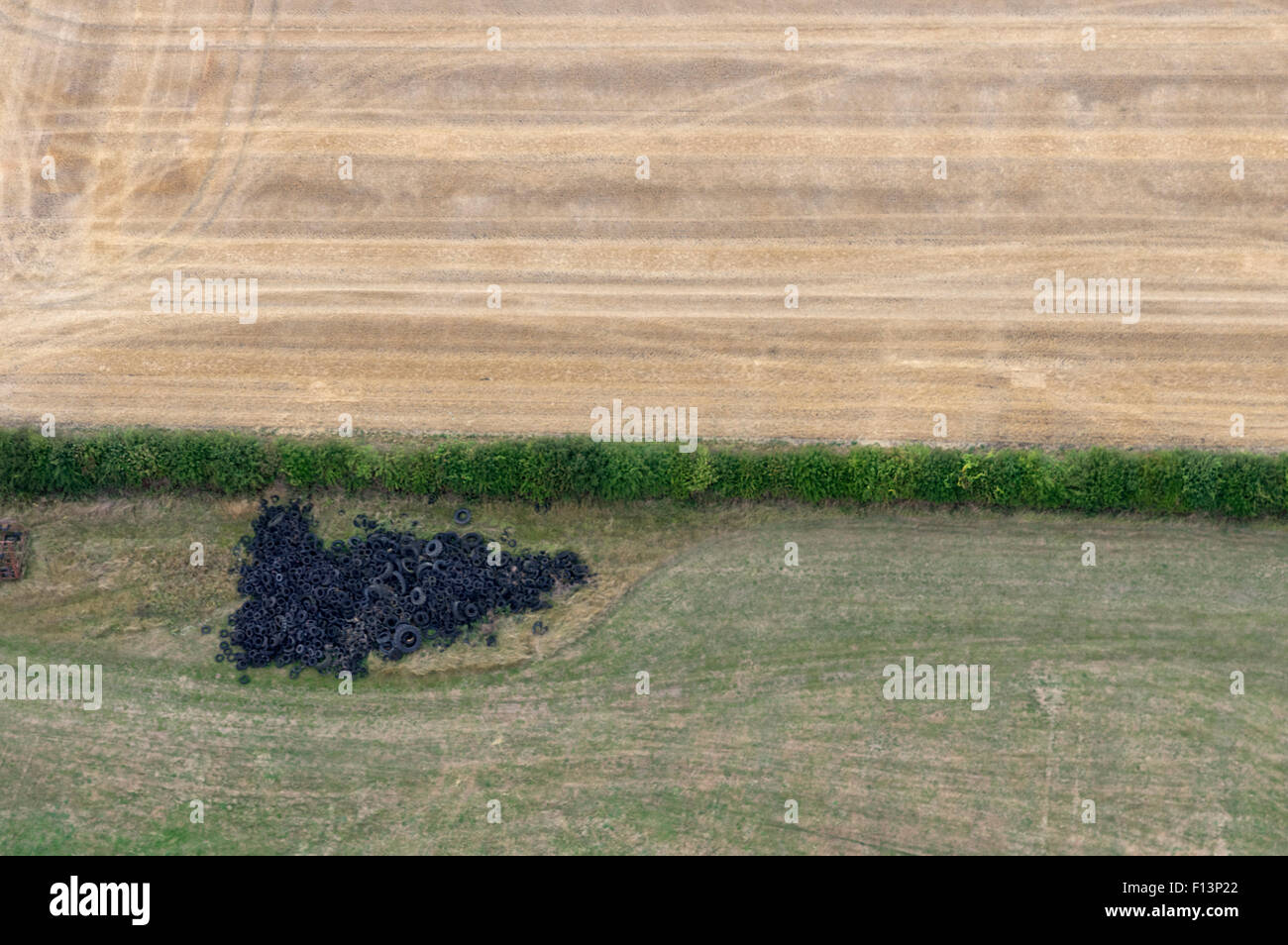 Pile of tyres in a field in Oxfordshire UK viewed from a hot air ...