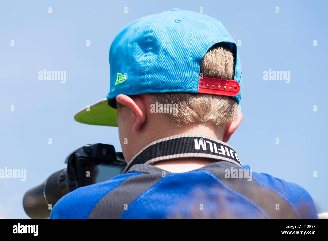 Boy with camera taking photos at the Ellingham & Ringwood Agricultural ...