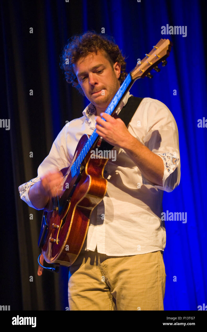 Guitarist with Deirdre Cartwright Band & Friends performing on stage at ...