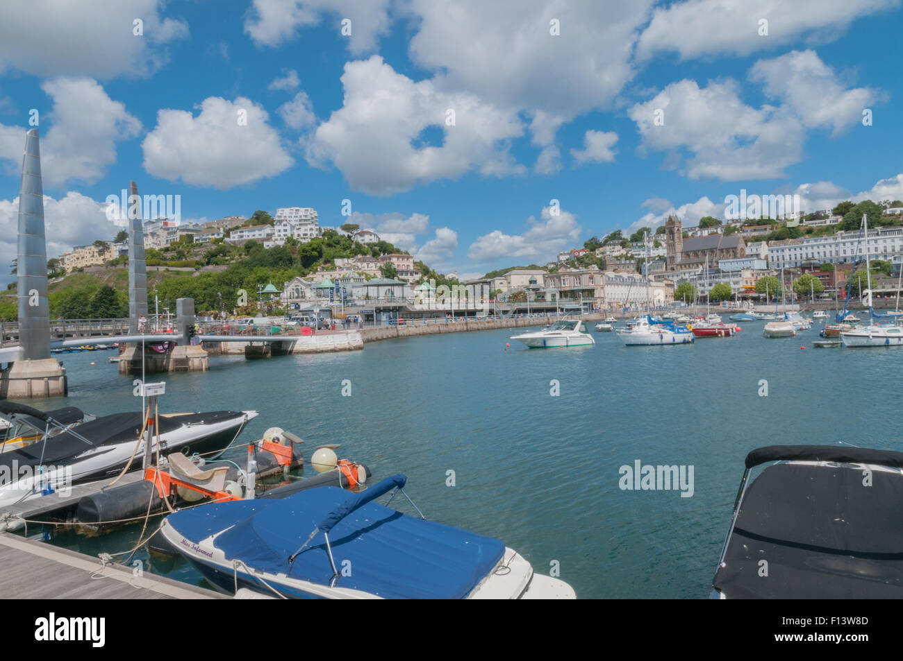 Footbridge at the entrance to the Inner Harbour with yachts and boats ...