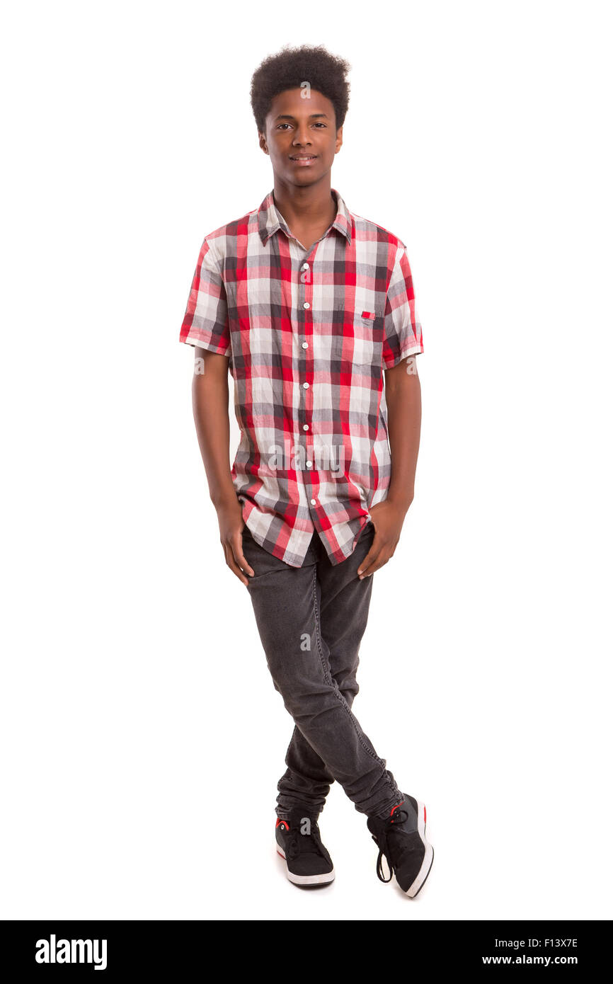 A casual young black Boy posing isolated Stock Photo - Alamy