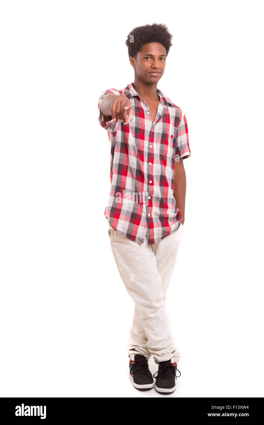 A casual young black Boy posing isolated Stock Photo - Alamy
