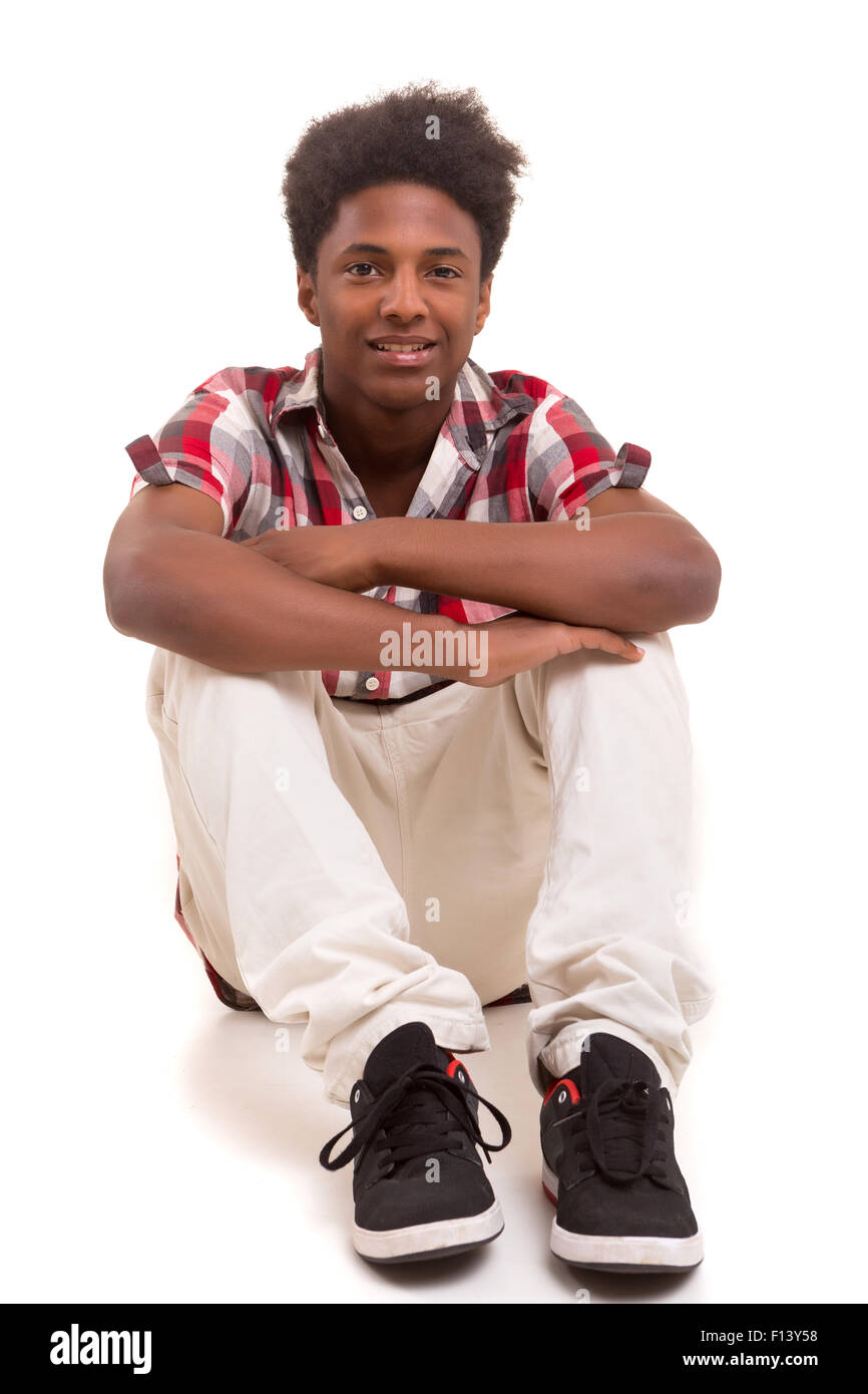 A casual young black Boy posing isolated Stock Photo - Alamy
