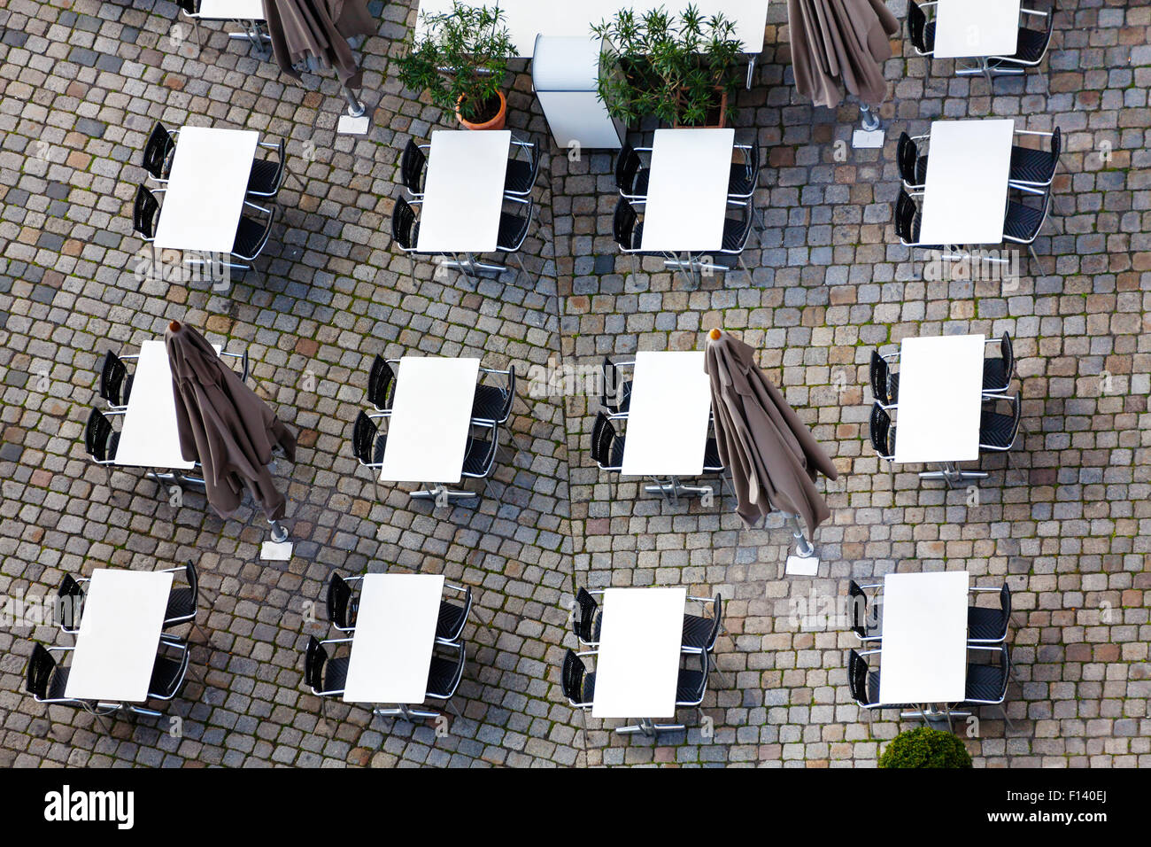 Many tables of street cafe view from above Stock Photo - Alamy