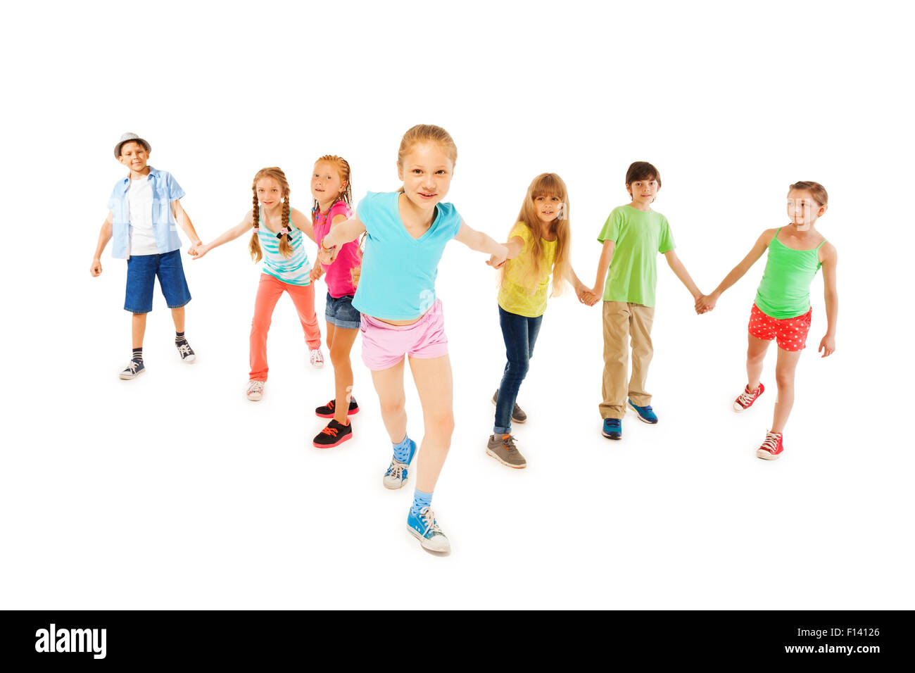 Girl hold hands with many friends and pull forward Stock Photo - Alamy
