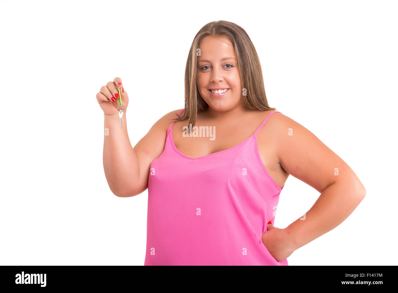Large woman very happy after buying a new house Stock Photo - Alamy