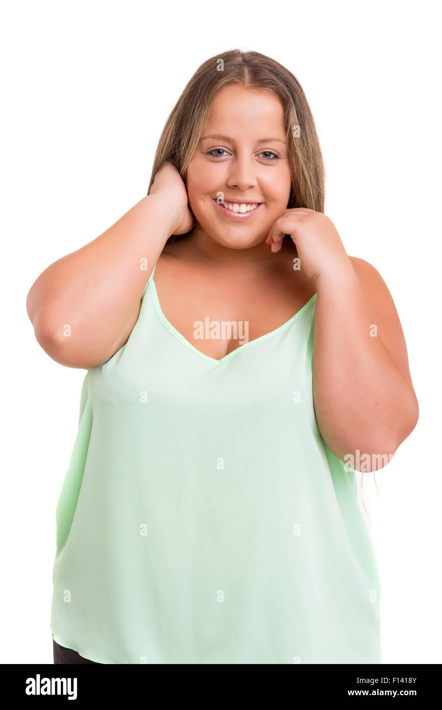 Happy overweighted woman posing isolated over white background Stock ...