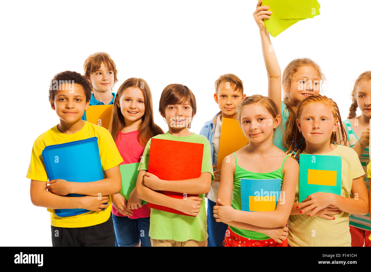 Classmates standing together with textbooks Stock Photo - Alamy