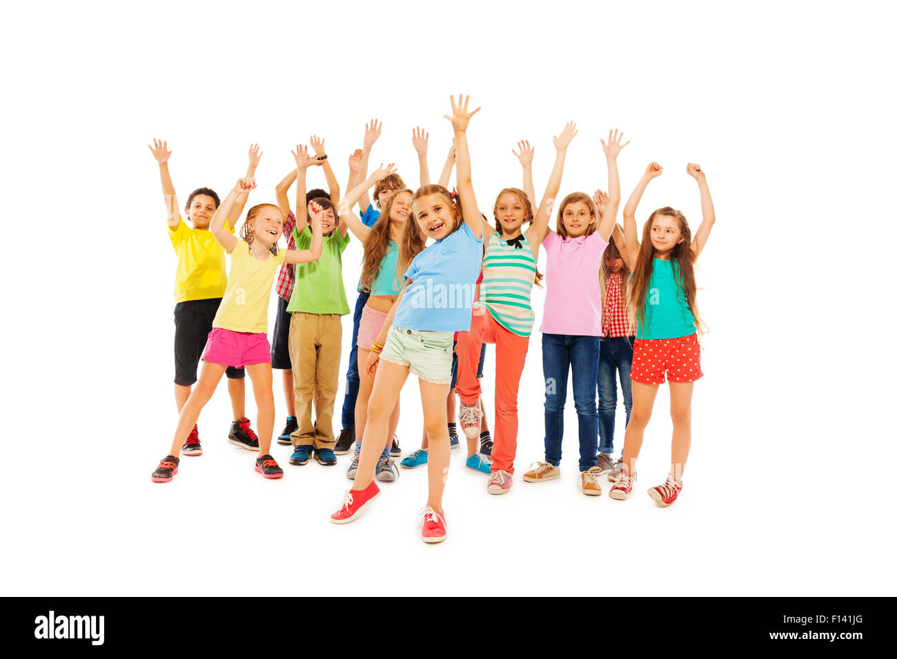 Many happy kids cheer and rise hands Stock Photo - Alamy