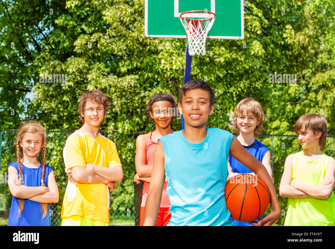 Arabian boy with international friends behind Stock Photo - Alamy