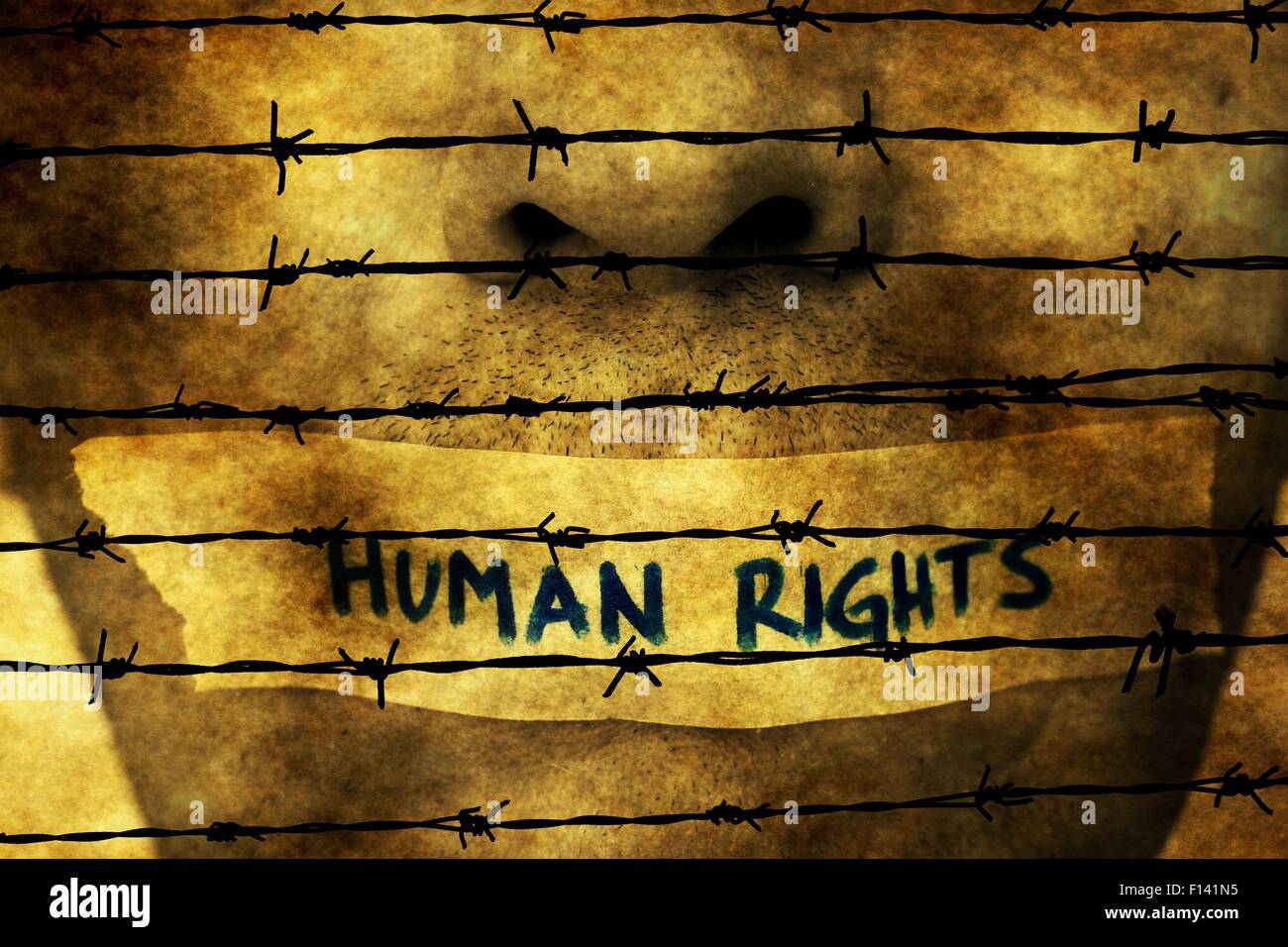 Women with tape over her mouth hi-res stock photography and images - Alamy