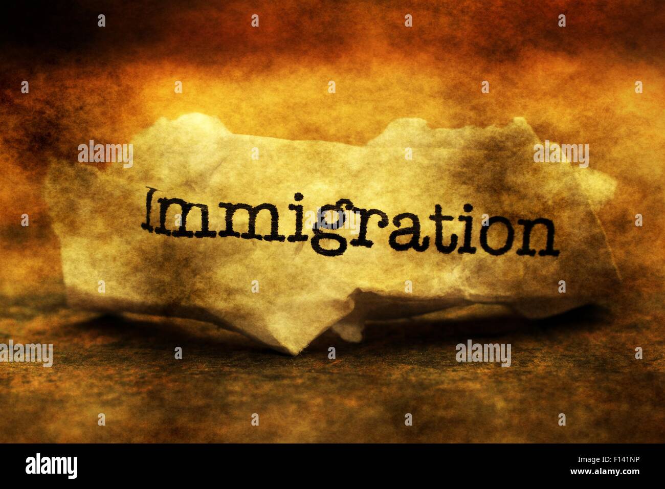 Immigration text on grunge paper Stock Photo - Alamy