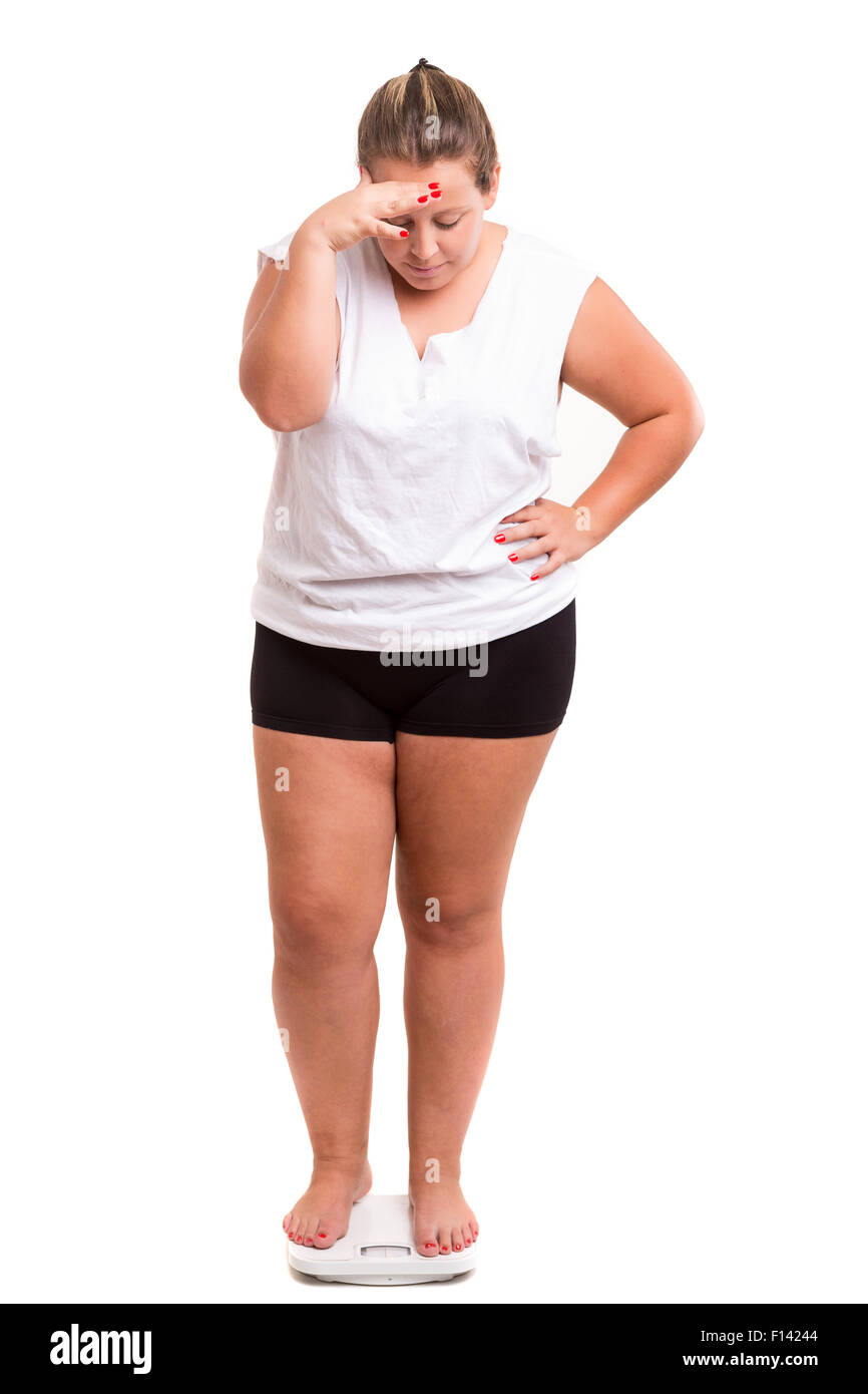 Fat woman very worried with her weight Stock Photo - Alamy