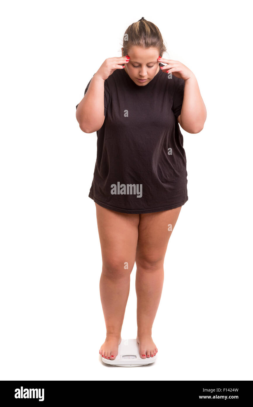 Fat woman very worried with her weight Stock Photo - Alamy