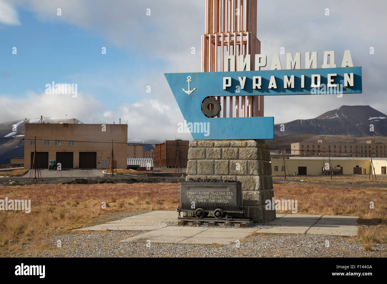 Sign and buildings in the abandoned mining town of Pyramiden on ...