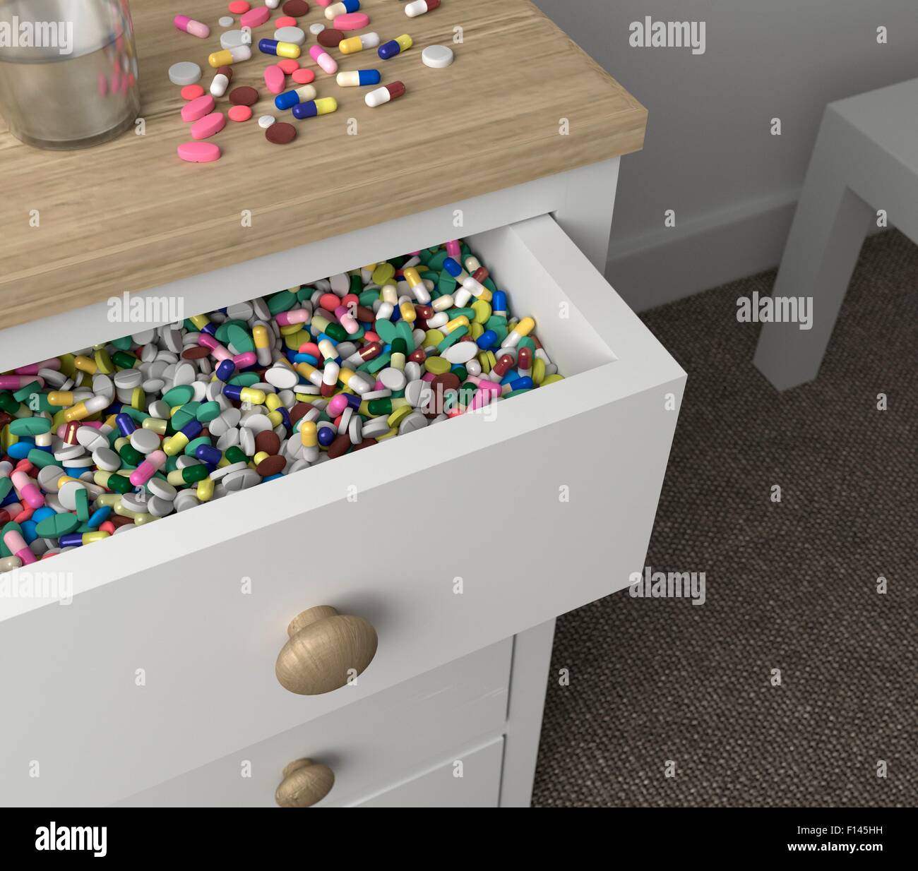 Drawer containg thousands of medical tablets and some selected to take ...