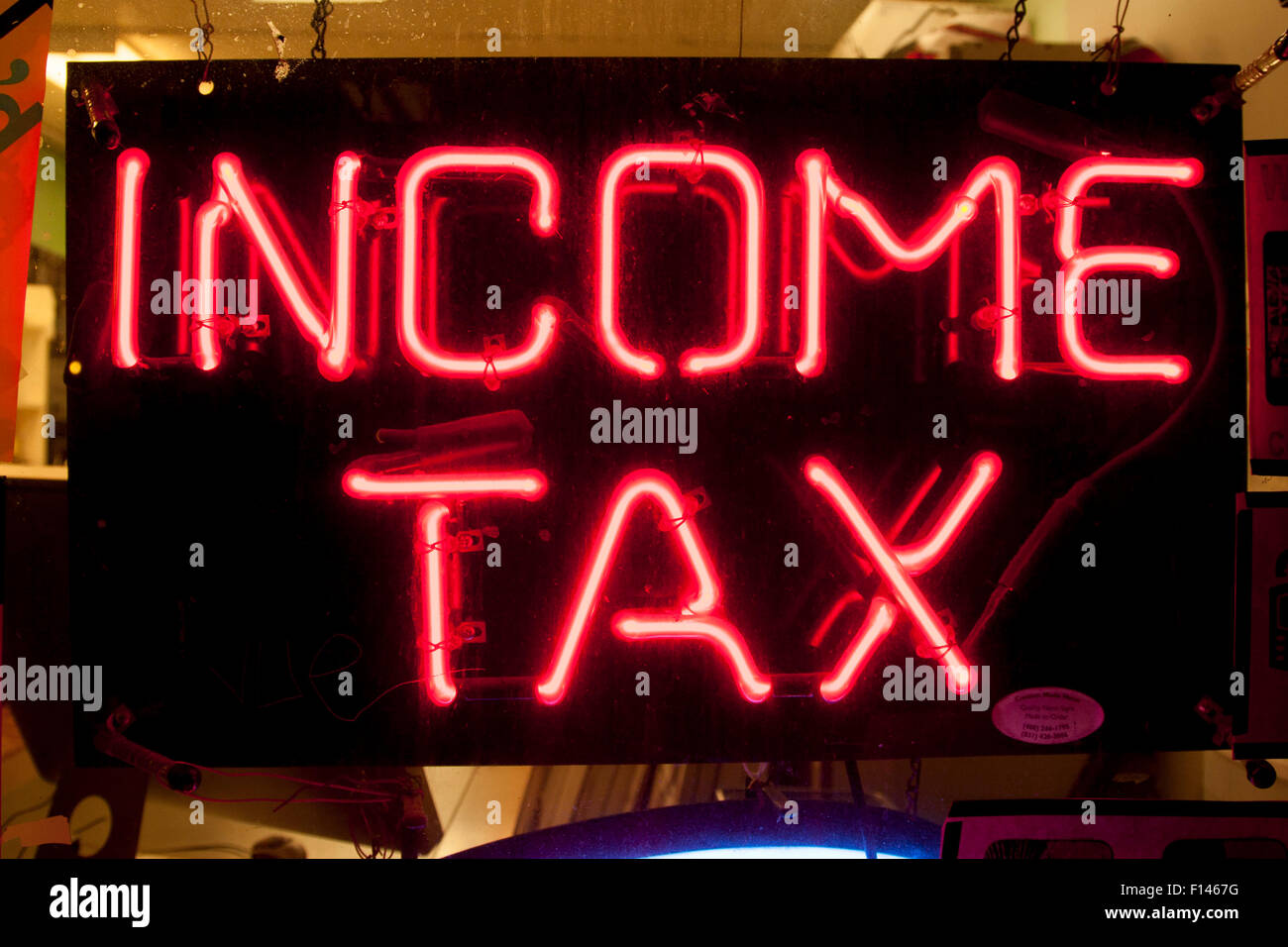 Income tax neon light hi-res stock photography and images - Alamy