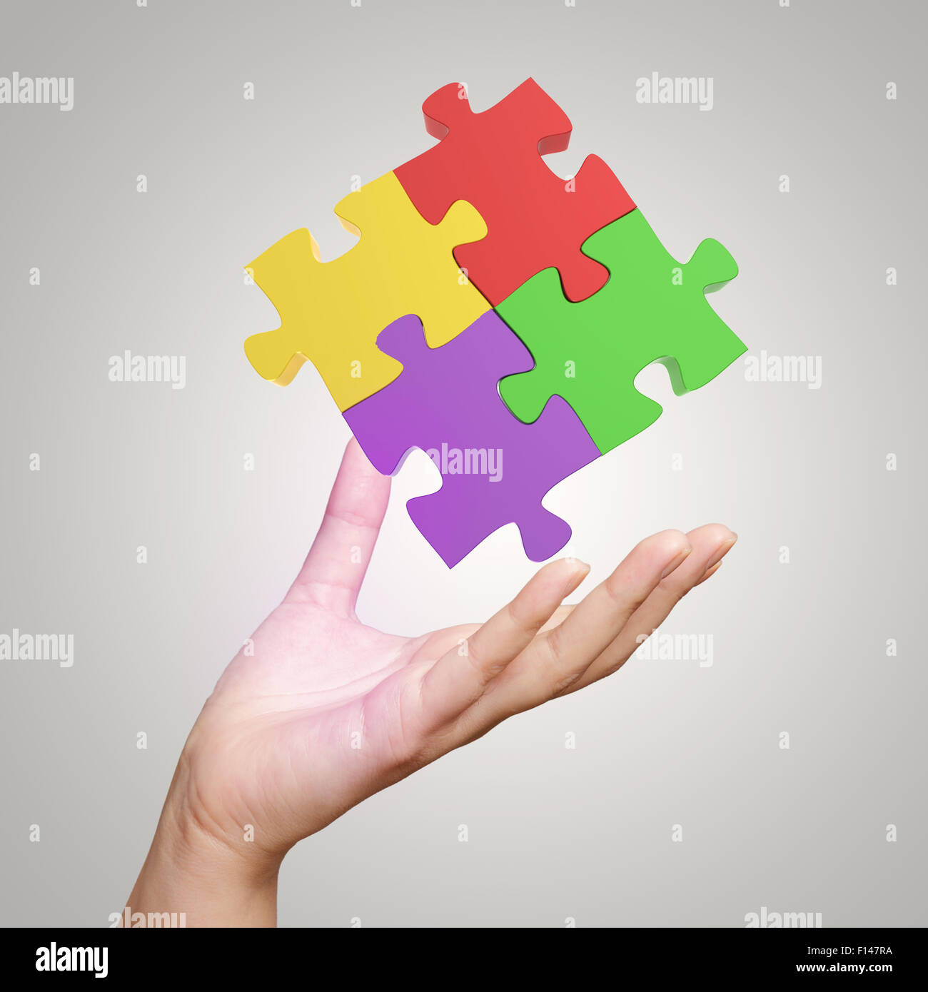 Hand showing 3d puzzle as concept Stock Photo - Alamy