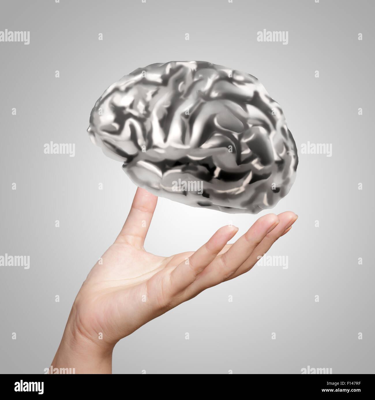 businessman hand showing 3d metal human brain as concept Stock Photo ...