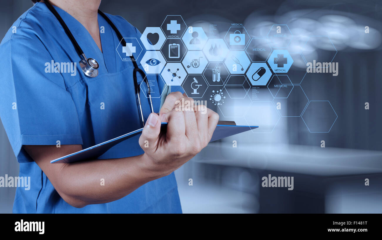 Medicine doctor hand working with modern computer interface as medical ...