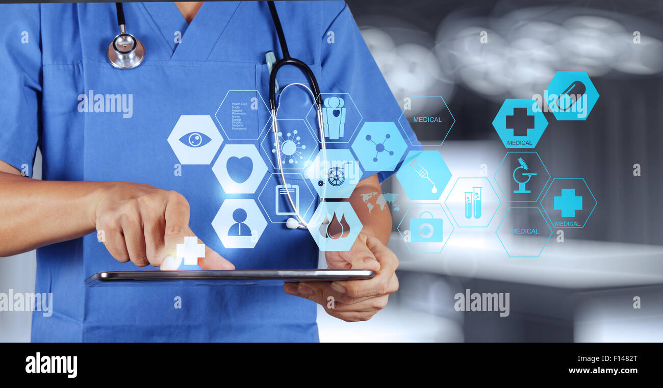 Medicine doctor hand working with modern computer interface as medical ...