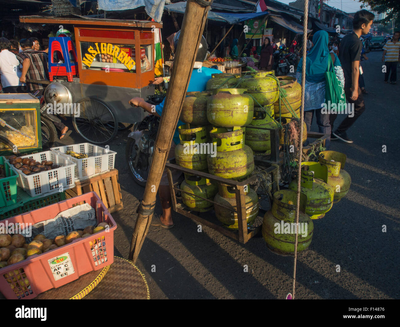Bottled gas vendor in a market place in Jakarta, Indonesia Stock Photo ...