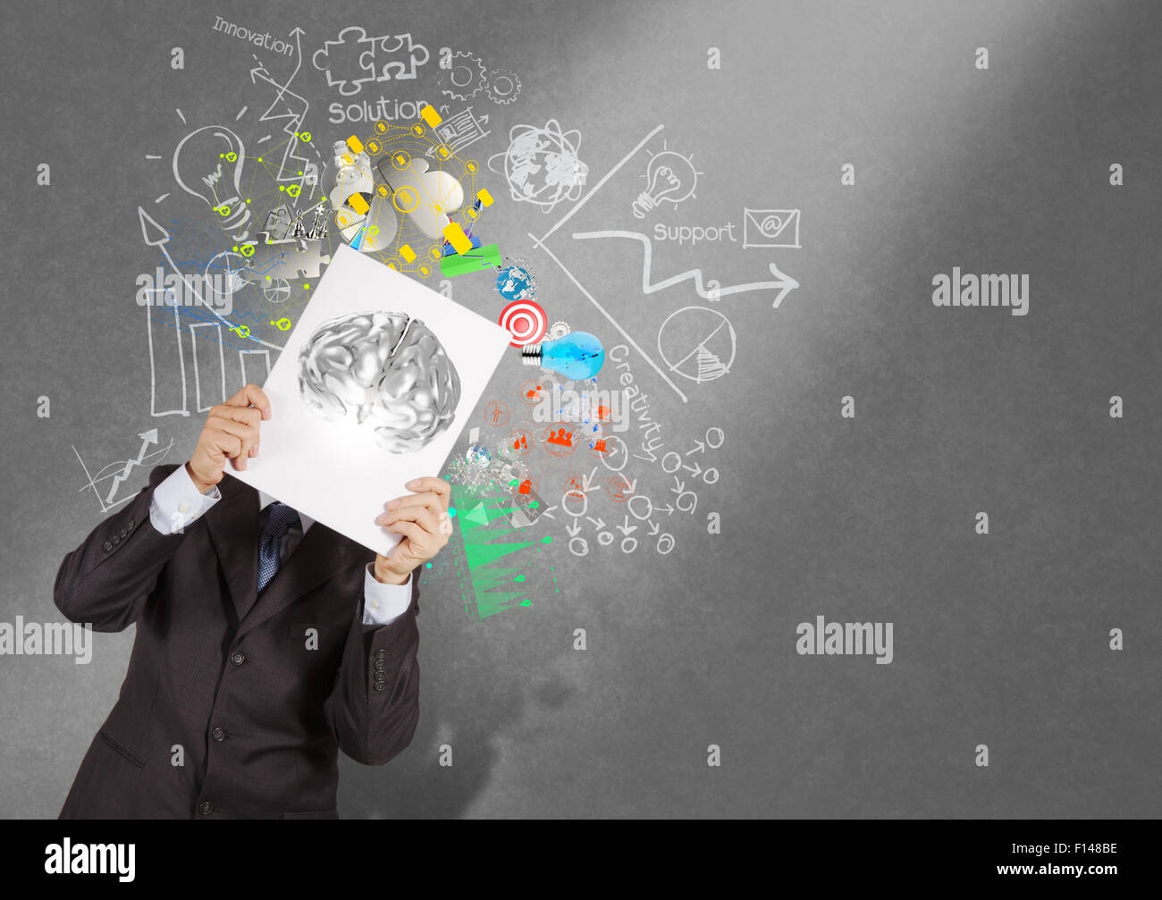 businessman hand show book of 3d metal brain as concept Stock Photo - Alamy