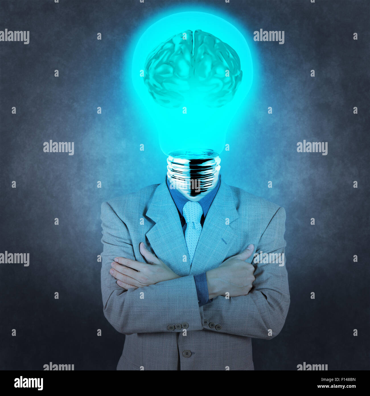 businessman with lamp-head 3d metal brain as concept Stock Photo - Alamy
