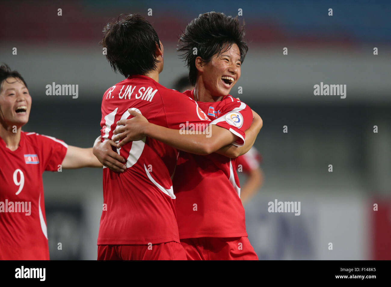 Nanjing, China. 26th Aug, 2015. Kyong Hyang Ri (R, PRK) Football/Soccer ...