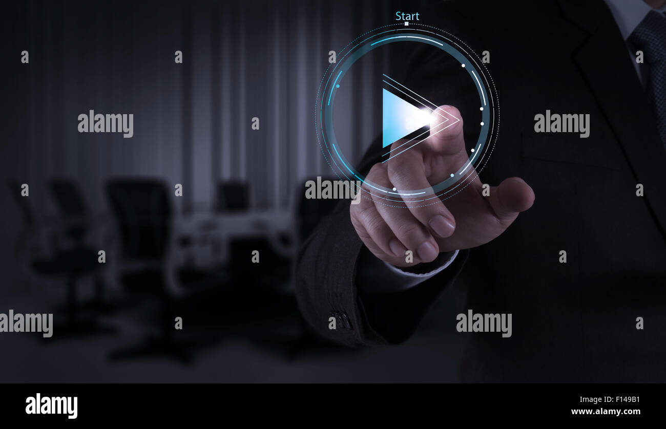 Businessman hand press play hi-res stock photography and images - Alamy