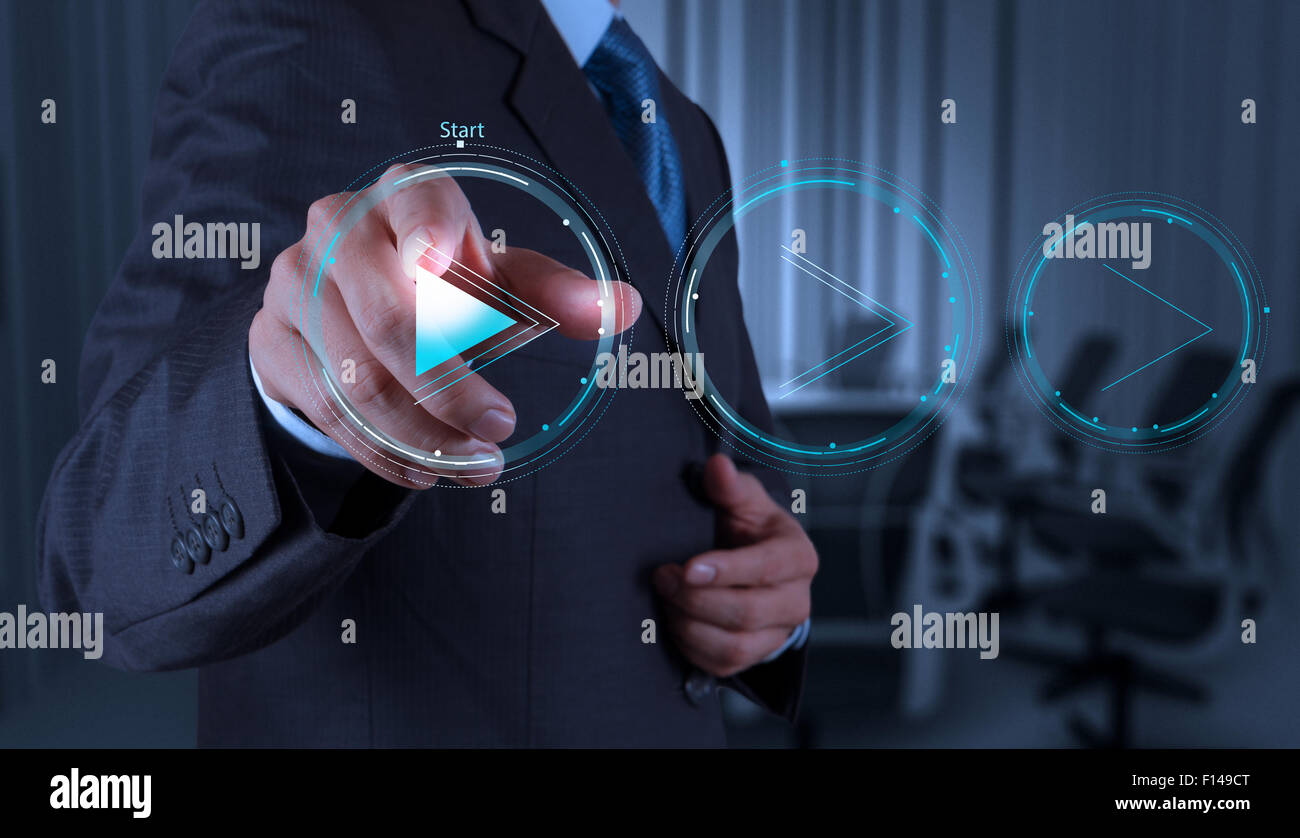 Businessman hand press play hi-res stock photography and images - Alamy