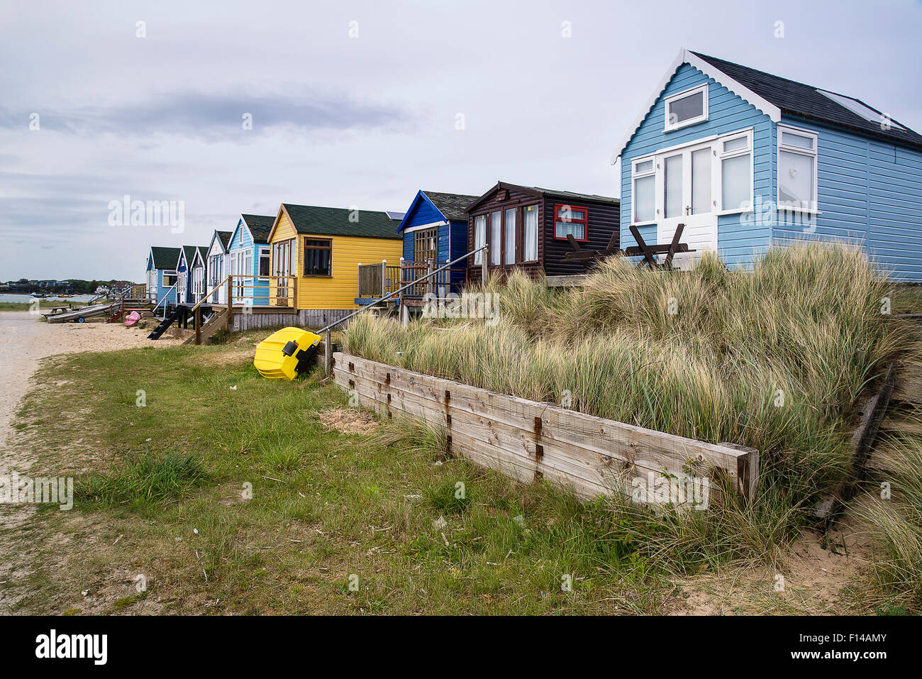 Beach huts on sand dunes and beach landscape Stock Photo - Alamy