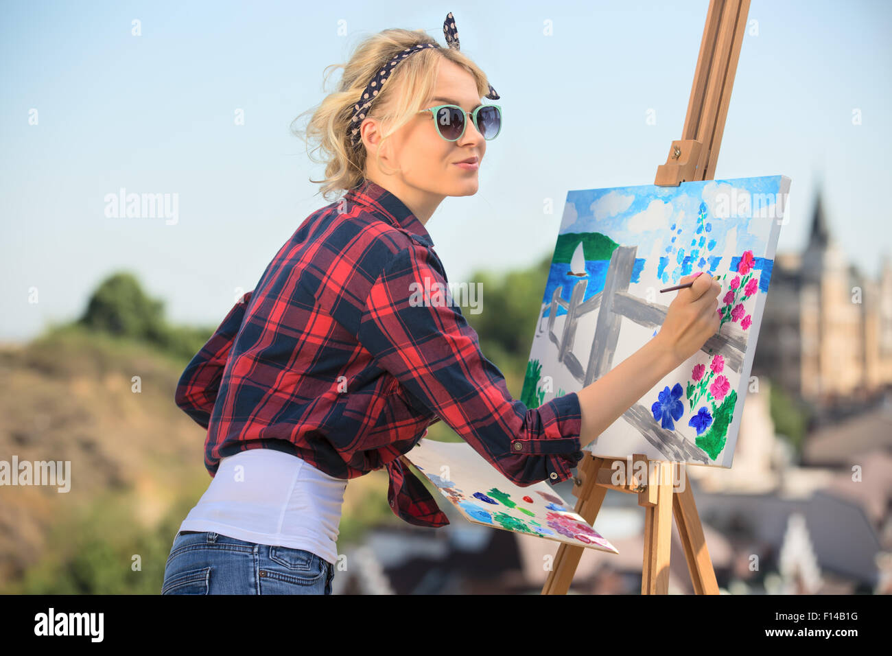 Beautiful female painting hi-res stock photography and images - Alamy