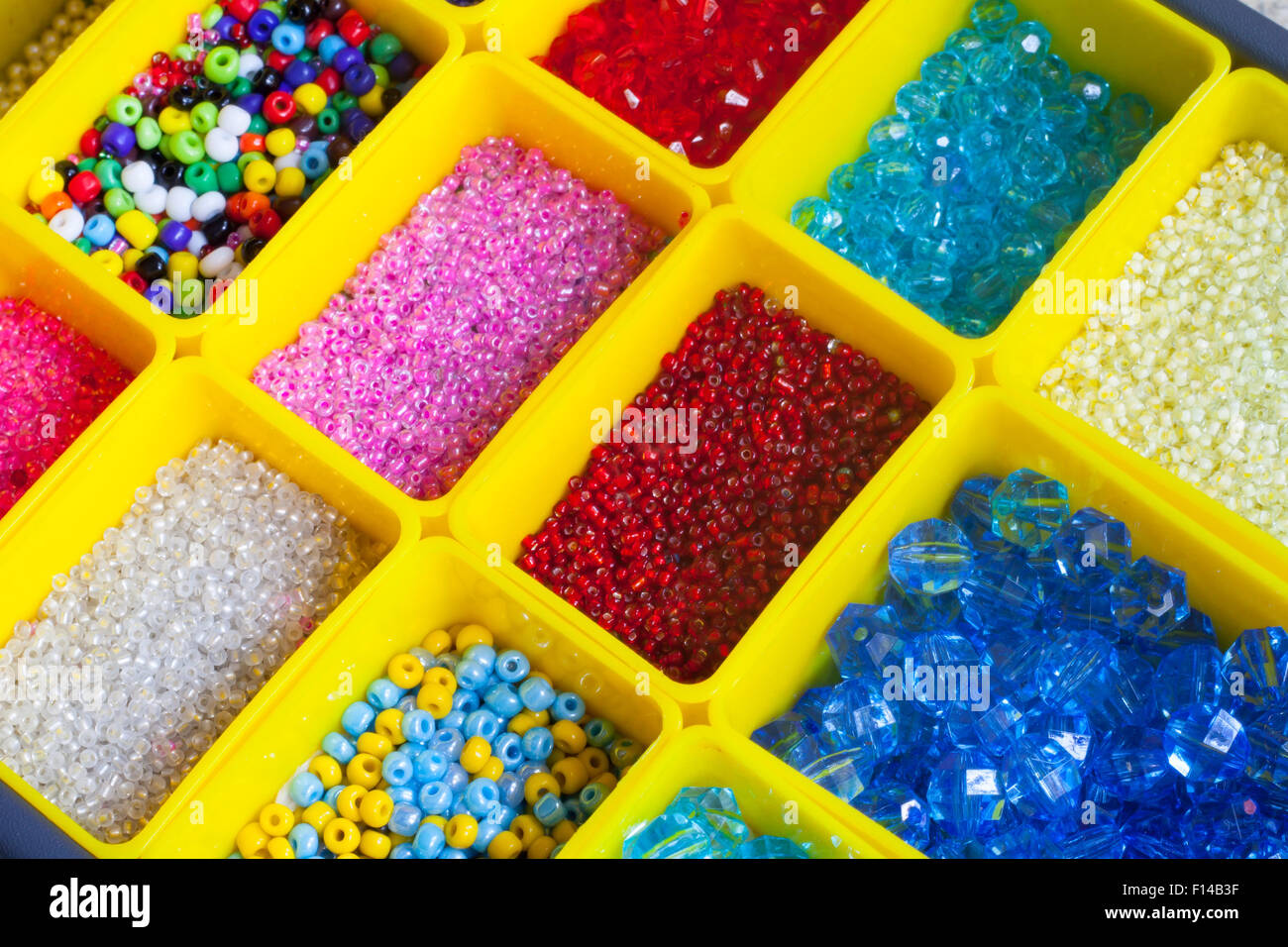 Beads in boxes Stock Photo - Alamy