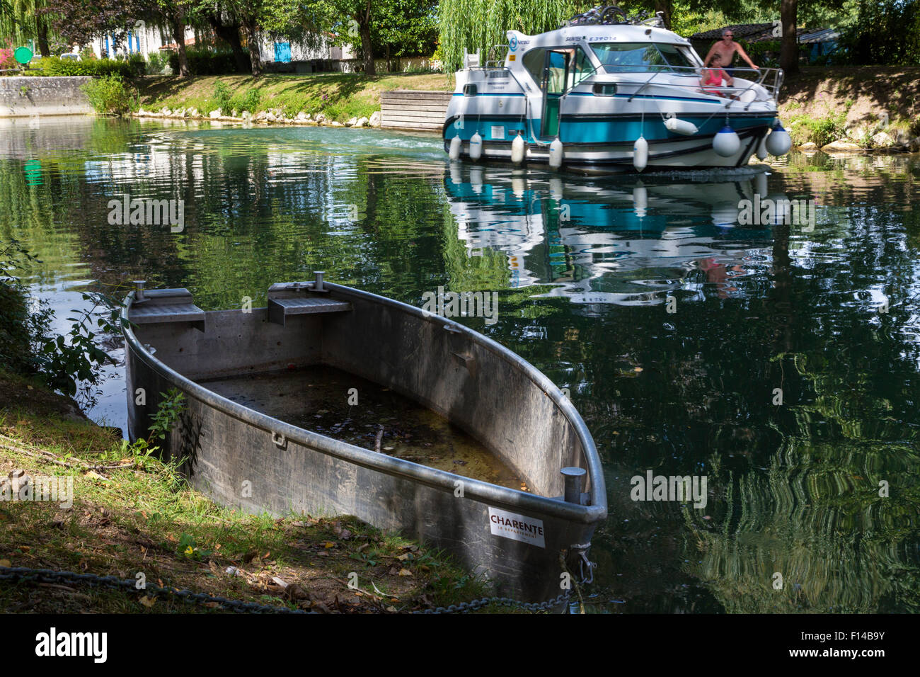 Boats on Canal des Moulins, Vibrac, Charente Maritime, France Stock ...