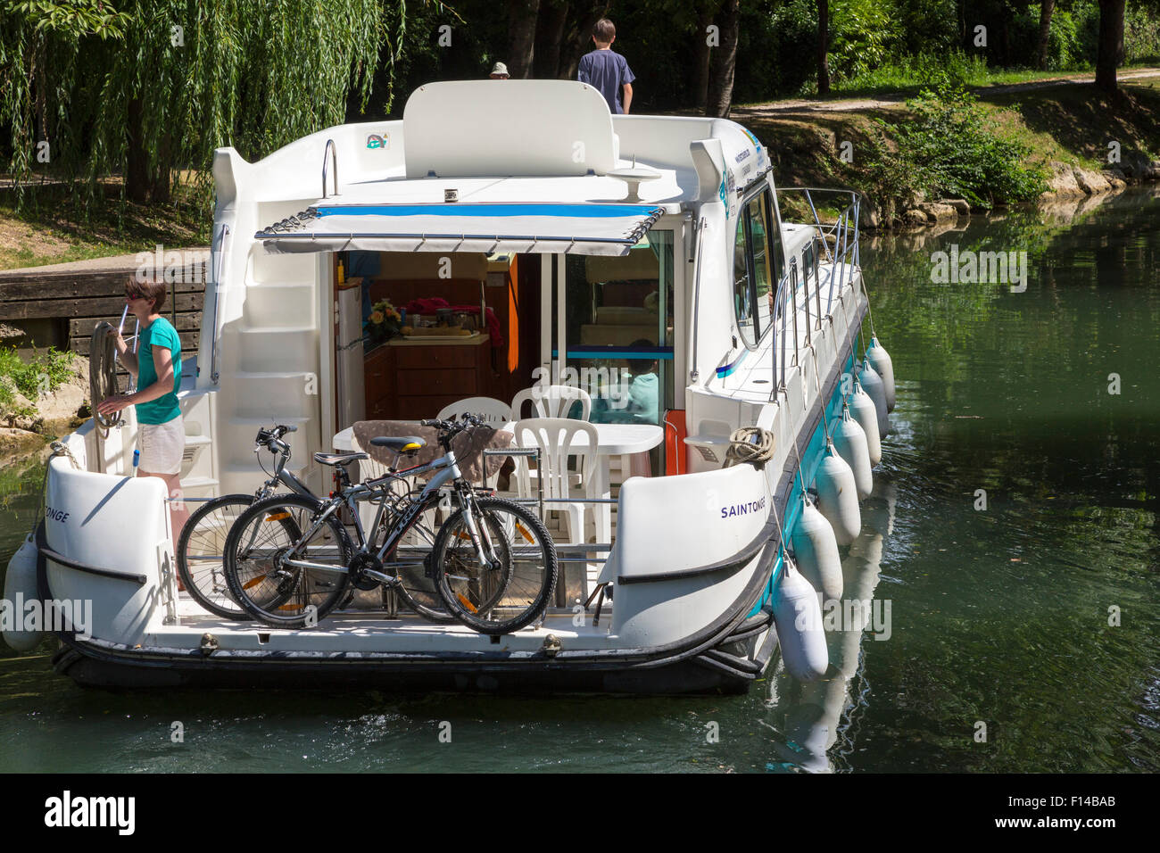 Boat on Canal des Moulins, Vibrac, Charente Maritime, France Stock ...