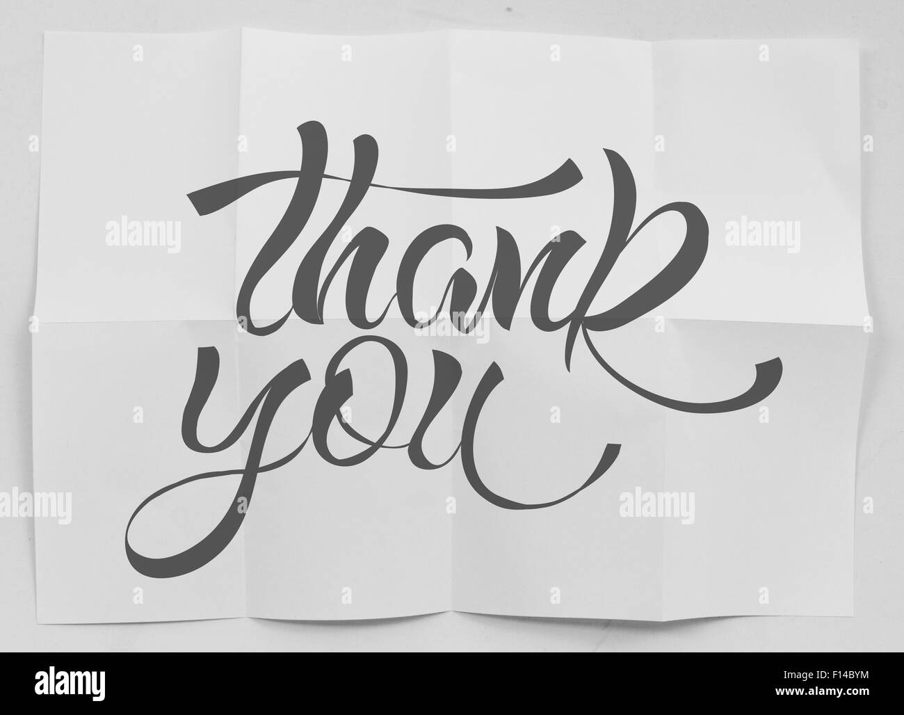 hand drawn design word THANK YOU on crumpled paper as concept Stock ...